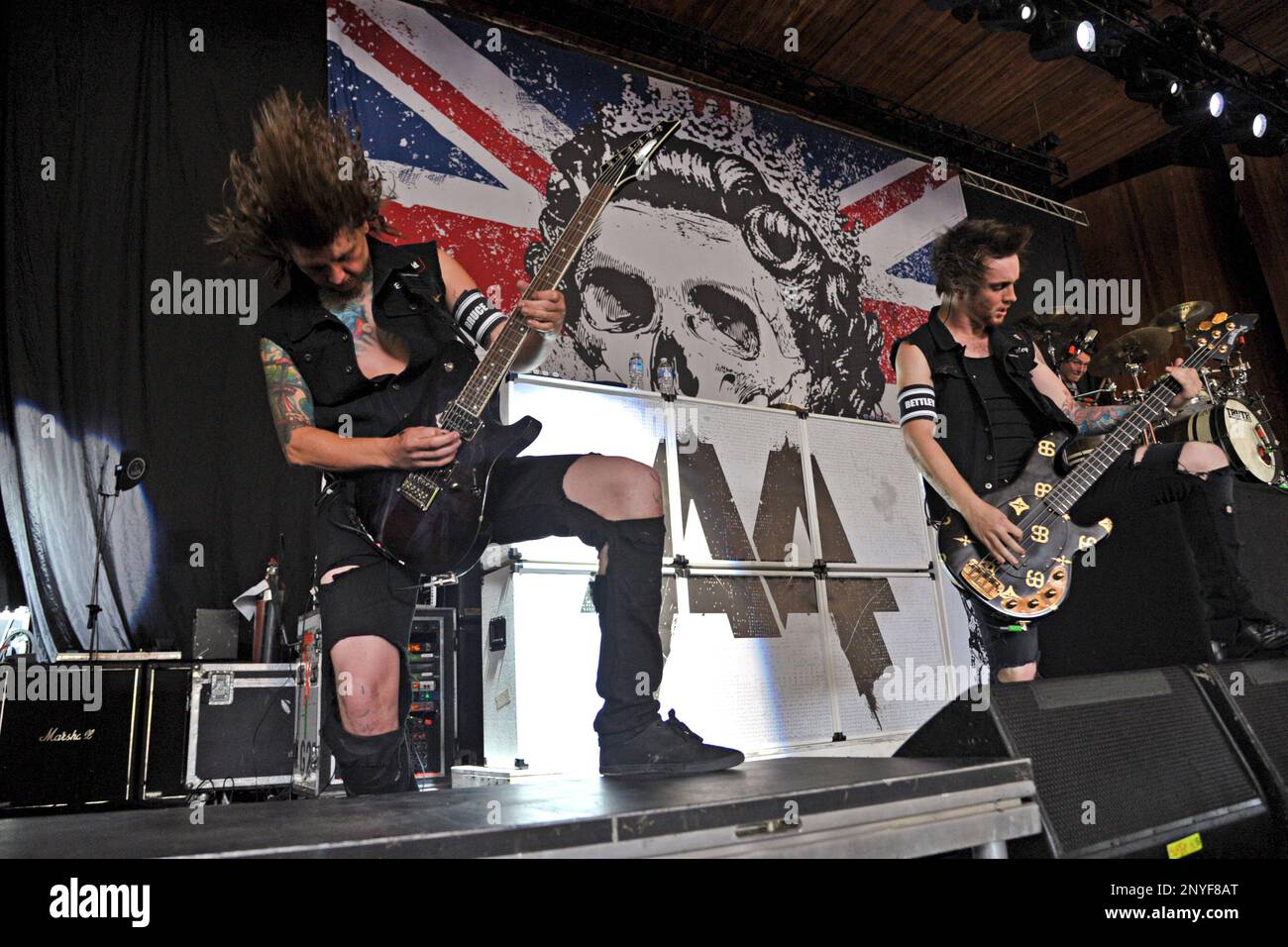 Ben Bruce and Sam Bettley of Asking Alexandria perform during the ...
