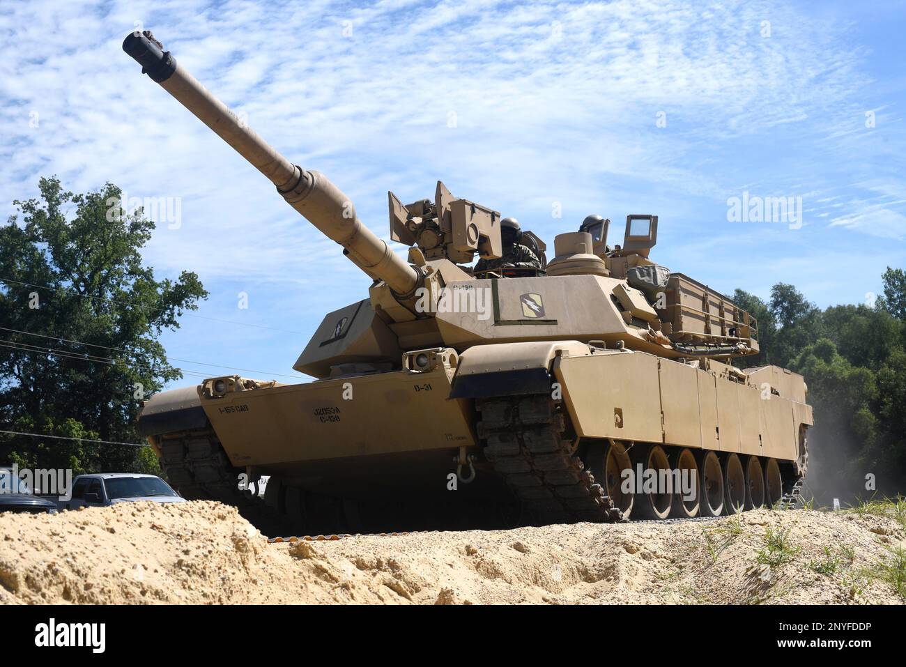 A M1A1 Abrams tank navigates on various types of matting systems ...