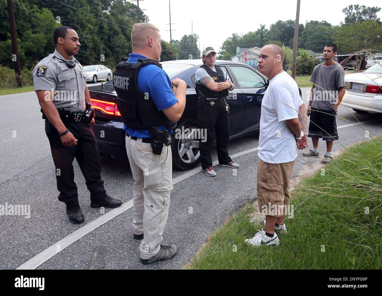 Edgecombe County Sheriff's Office Lt. Kevin West, second from left ...