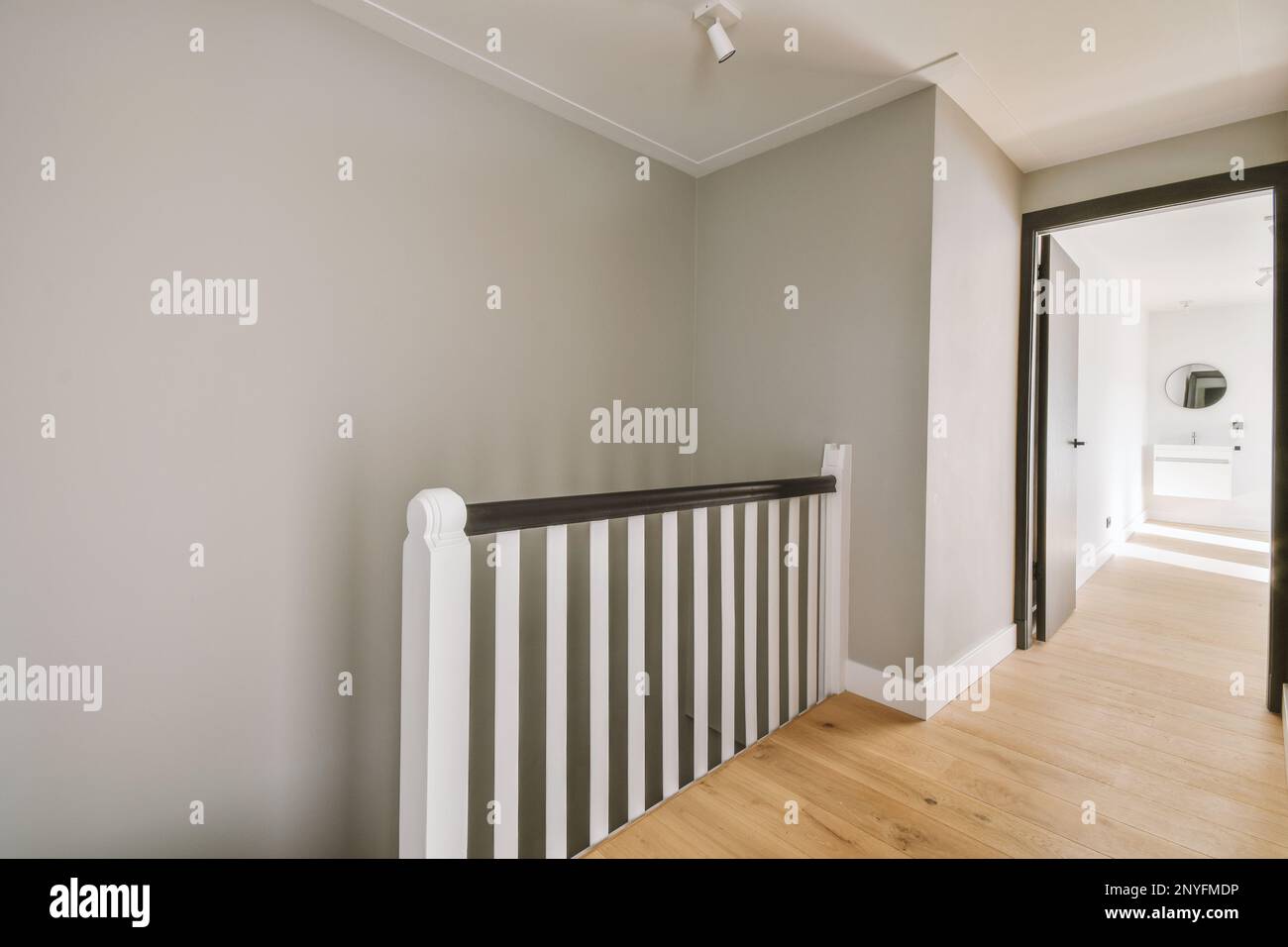 Interior design of minimalist style hallway with gray walls and ...