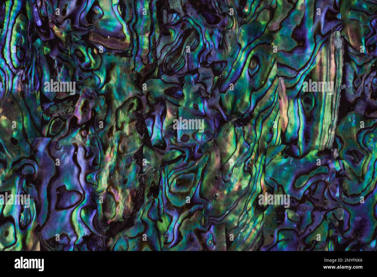 Abstract background of pearl multi-colored surface with purple green ...