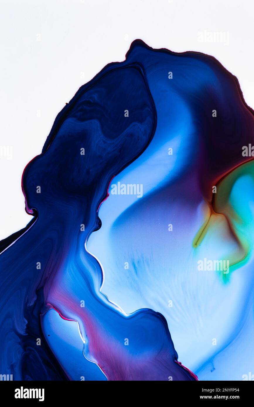 Beautiful abstraction of liquid paints in slow blending flow mixing ...