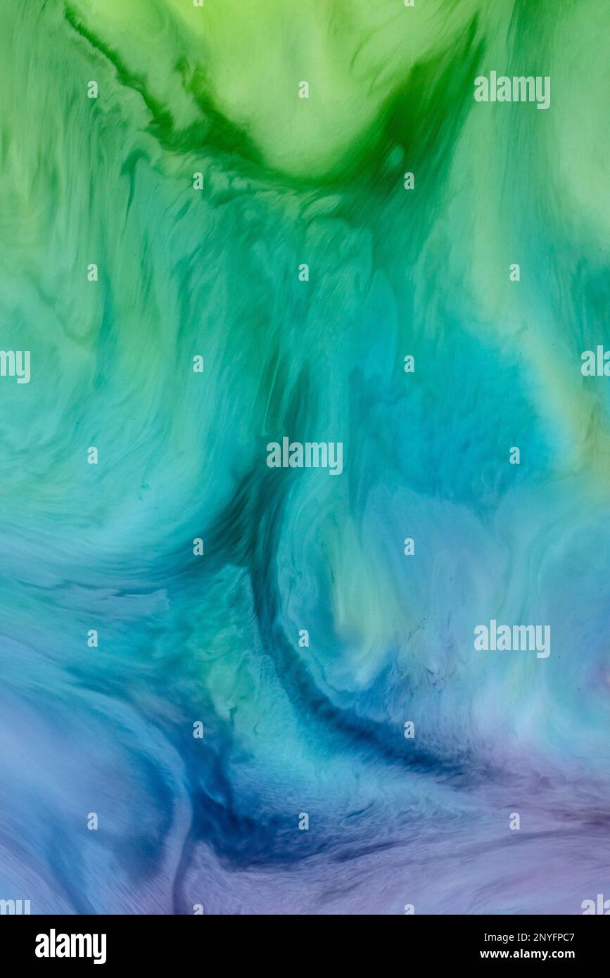 Beautiful abstraction of liquid paints in slow blending flow mixing ...