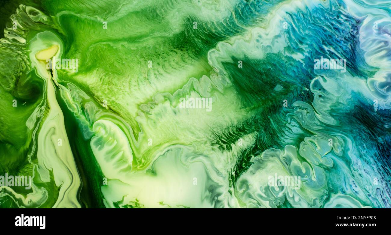 Beautiful abstraction of liquid paints in slow blending flow mixing ...