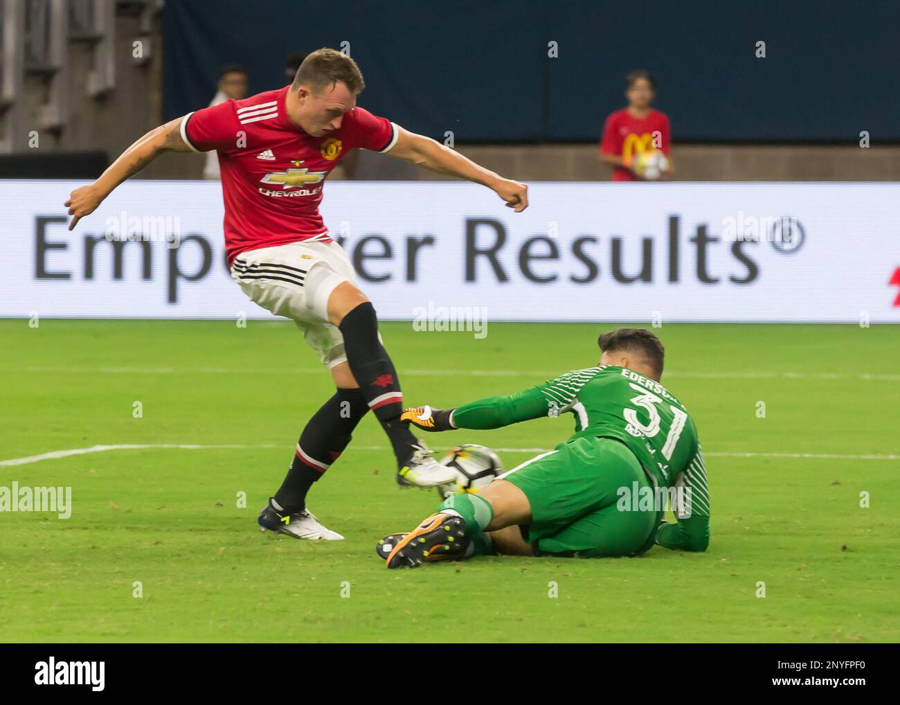 HOUSTON, TX - JULY 20: Manchester United Phil Jones (4) attempts to ...