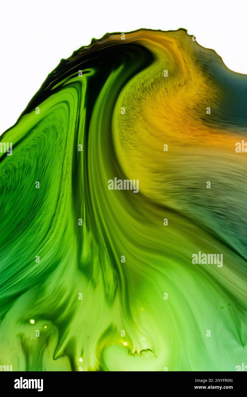 Beautiful abstraction of liquid paints in slow blending flow mixing ...