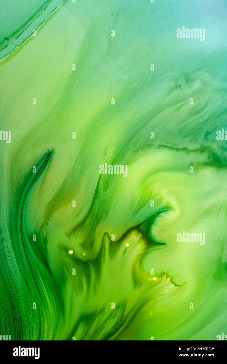 Beautiful abstraction of liquid paints in slow blending flow mixing ...