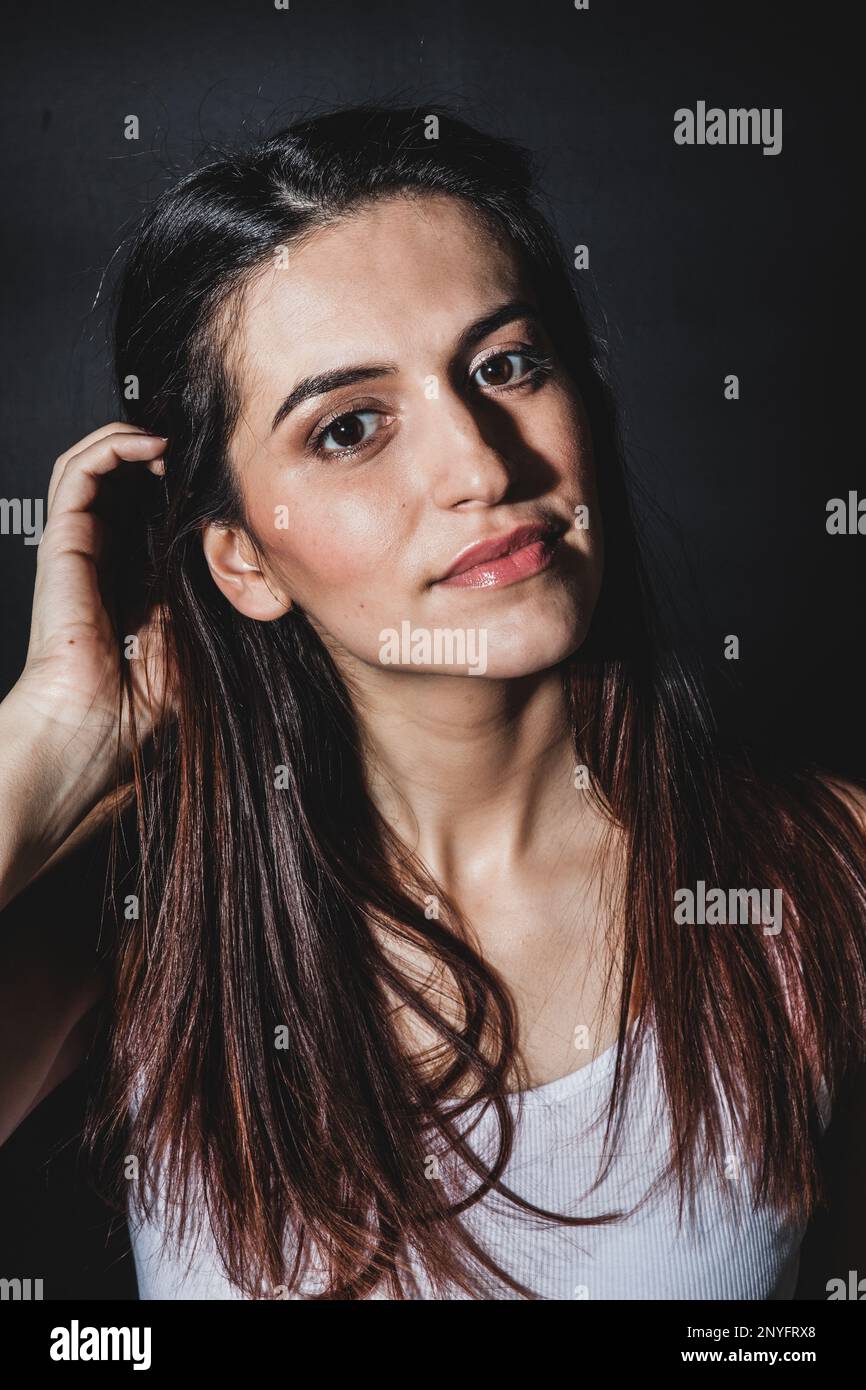 Beautiful lady posing in studio Stock Photo - Alamy