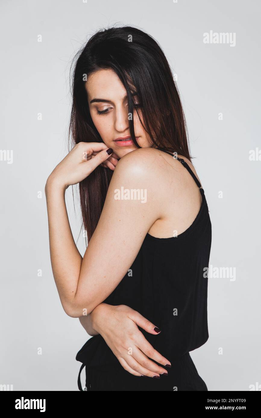 Beautiful lady posing in studio Stock Photo - Alamy