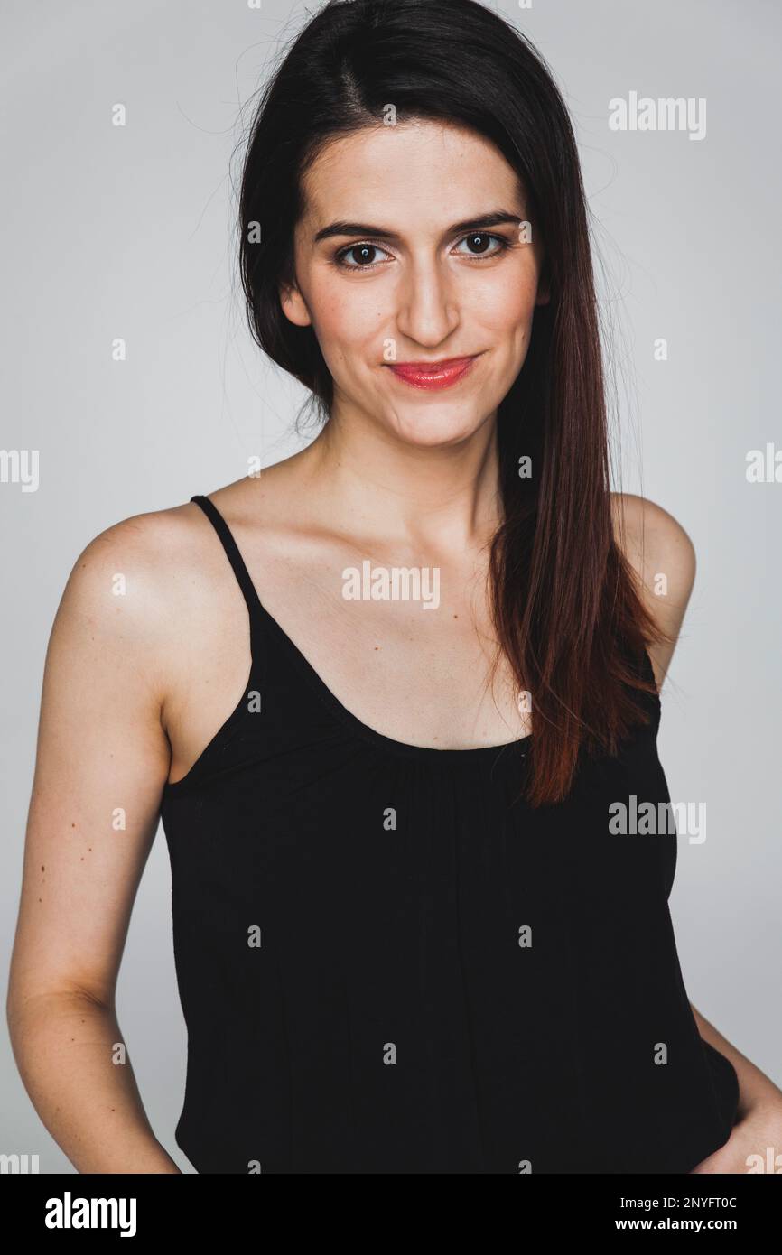 Beautiful lady posing in studio Stock Photo - Alamy