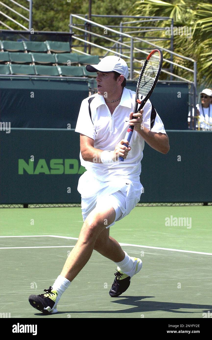 Mardy Fish returns a shot during the 2003 NASDAQ-100 Open Tennis ...