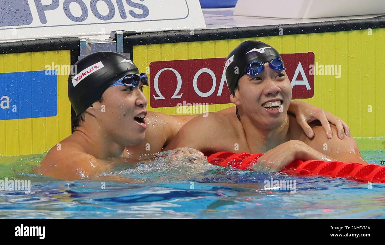 Japanese swimmer Ippei Watanabe, placed 3rd (R) and Yasuhiro Koseki ...