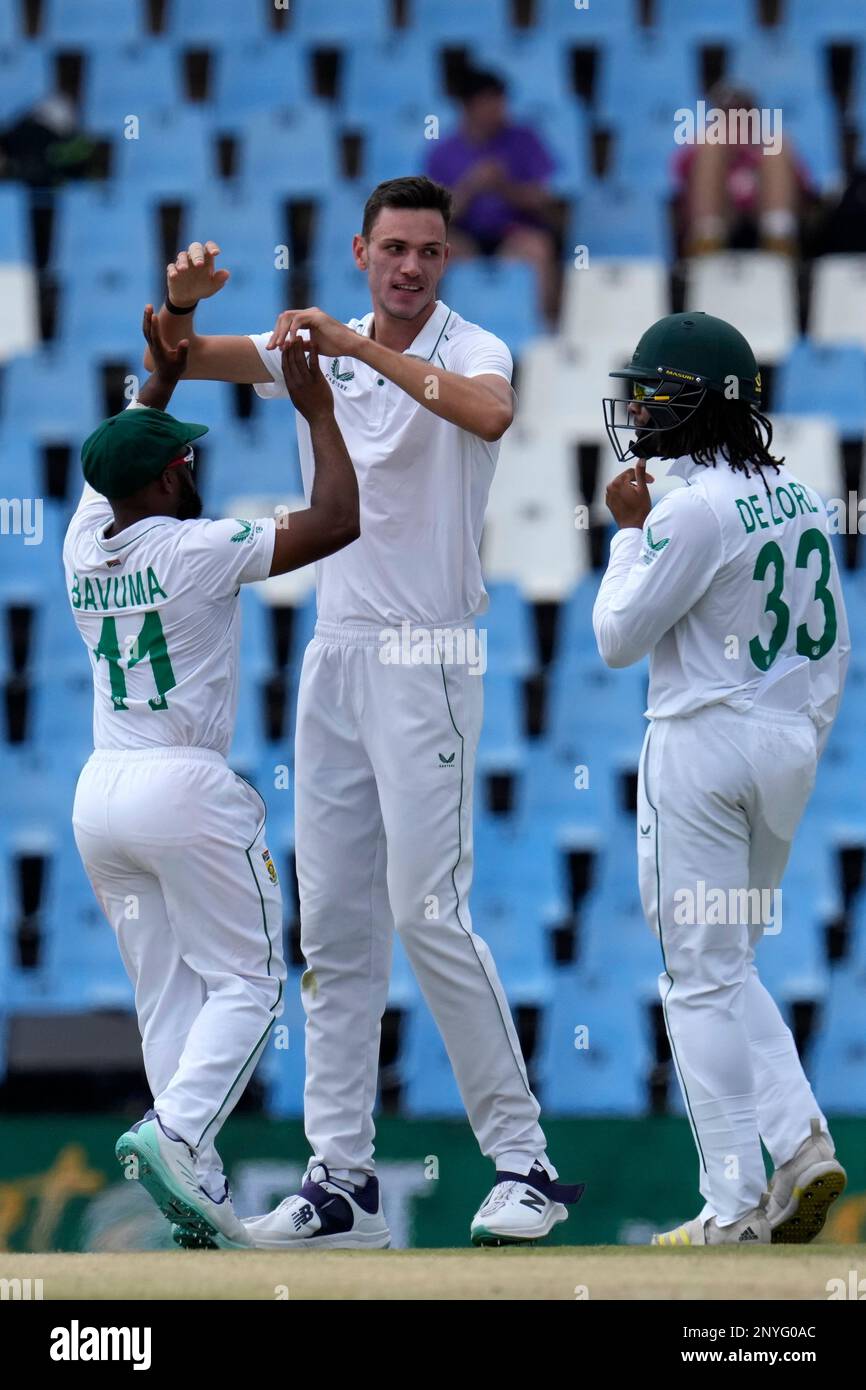South Africa's bowler Marco Jansen, centre, celebrates with captain ...