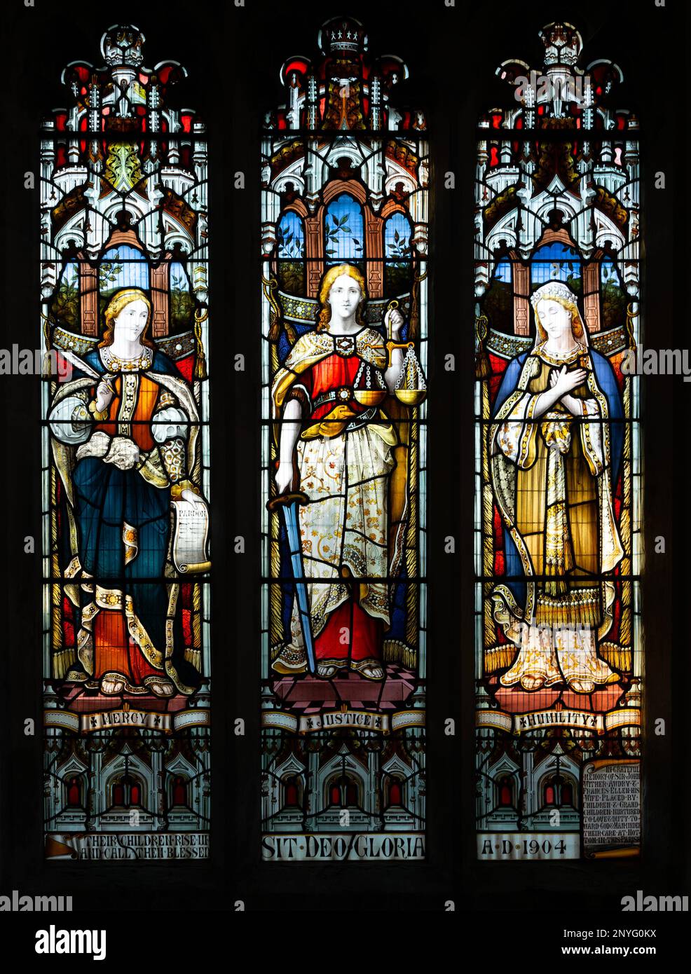 Stained glass window depicting Mercy, Justice, Humility in church of ...