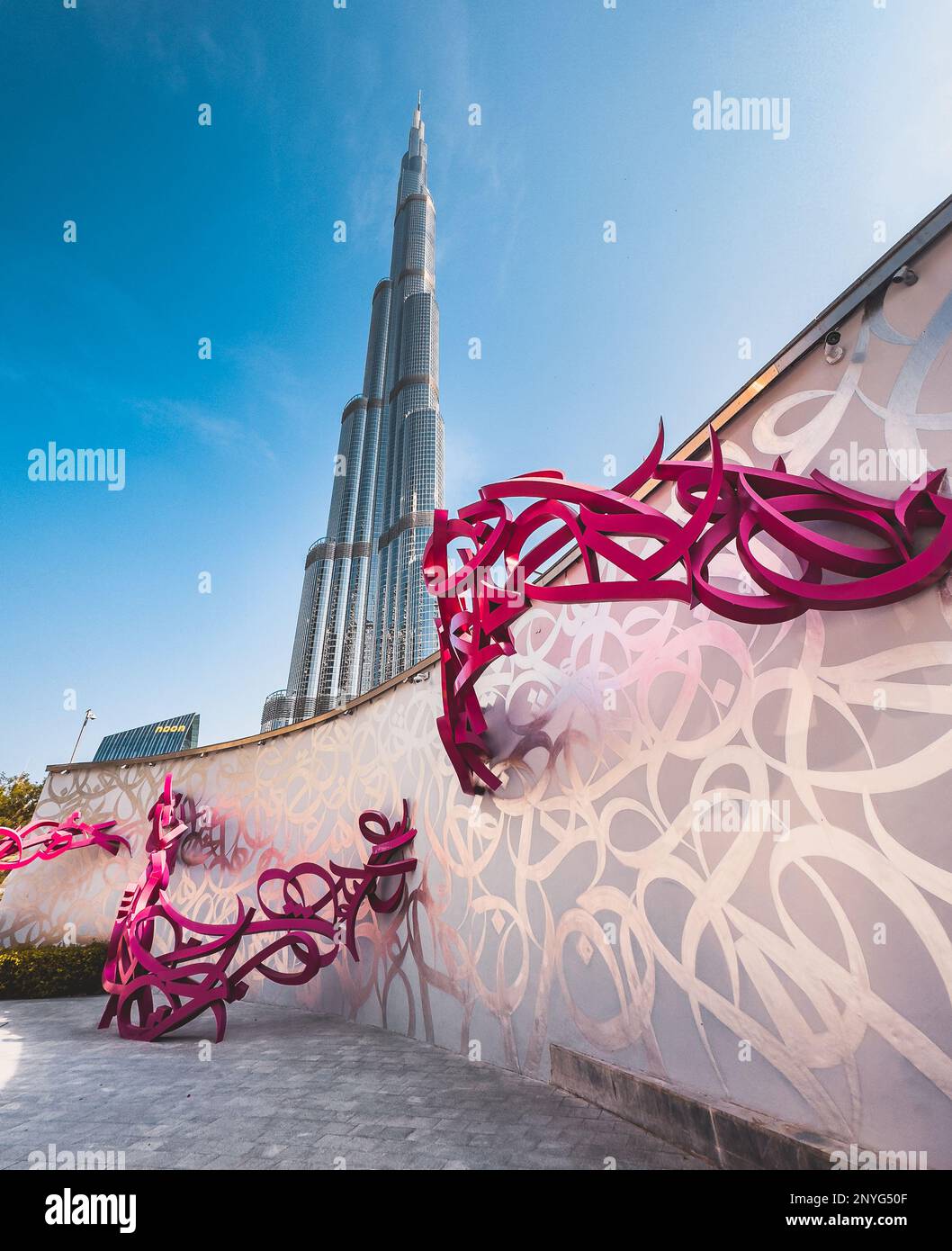 Burj Khalifa view from Burj park with wall art design in Downtown Dubai ...