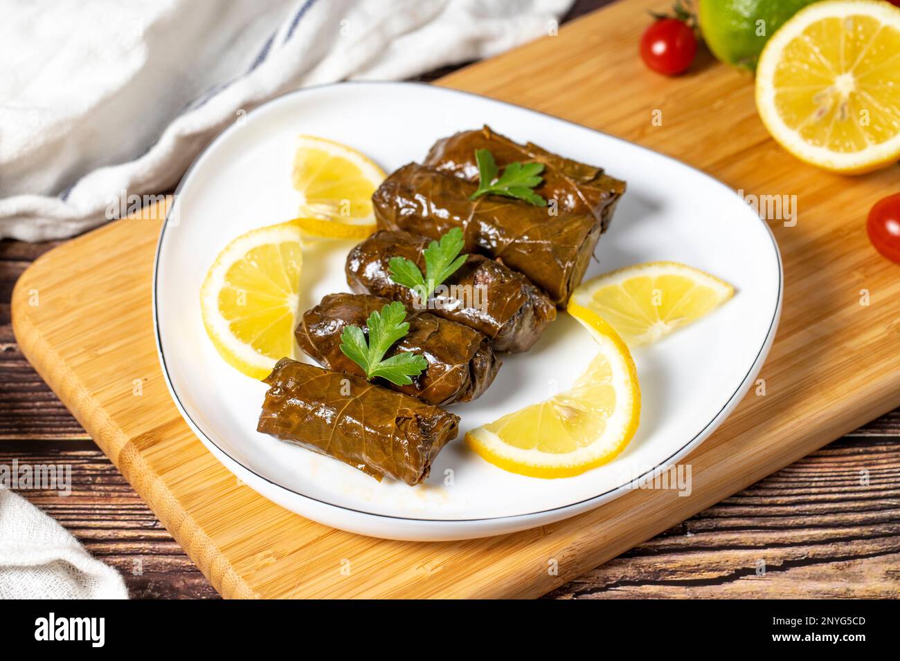 Olive oil leaf wrap. Turkish cuisine delicacies. Wrapping grape leaves ...