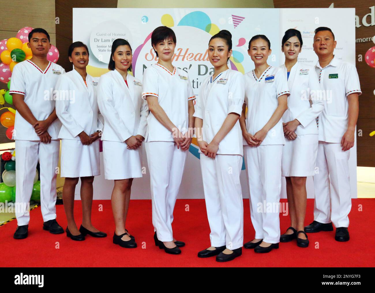Nurses parading in their new uniforms as SingHealth unveils new ...