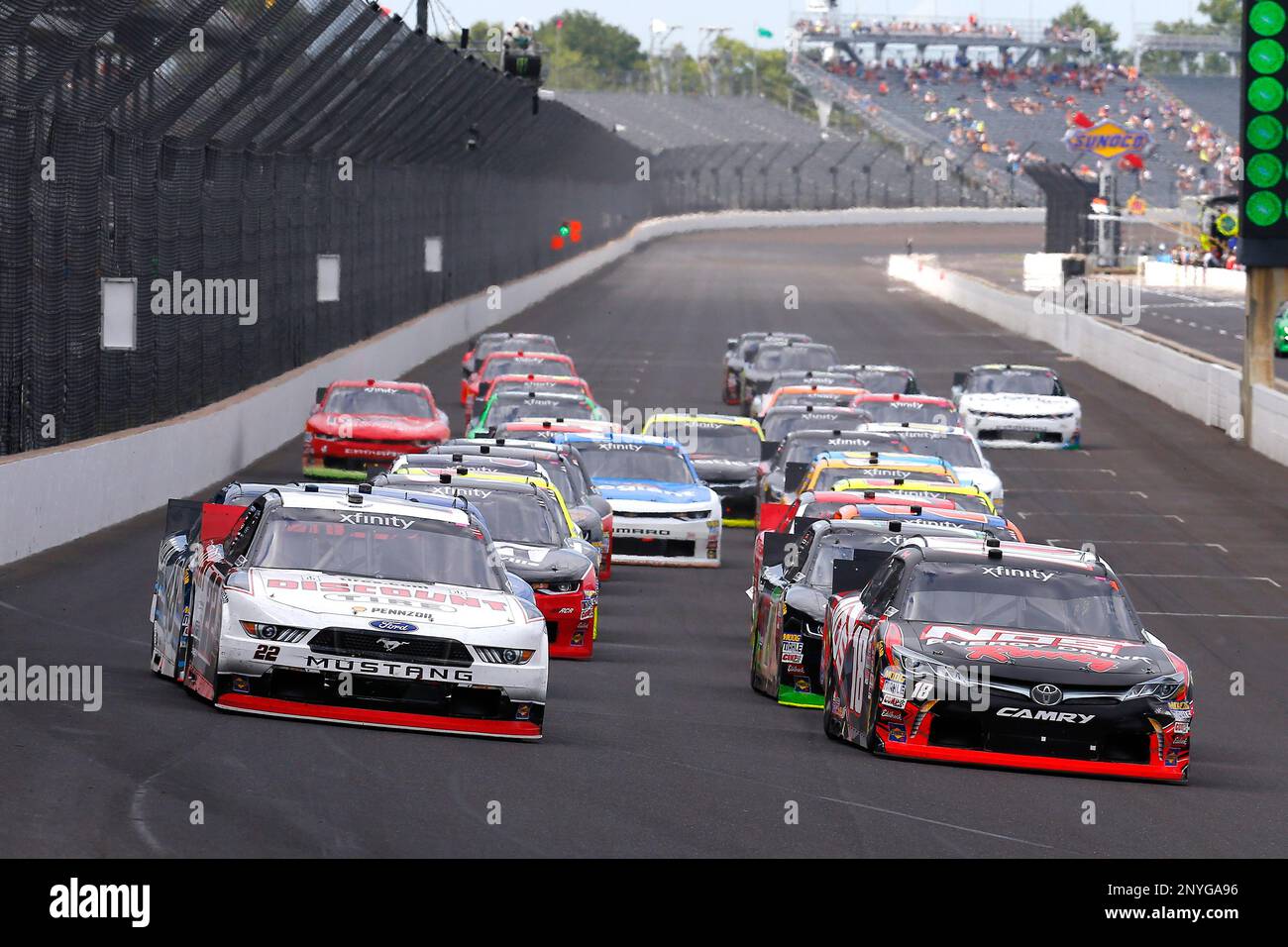 Kyle Busch (18) and Joey Logano (22) restart during the NASCAR Xfinity ...