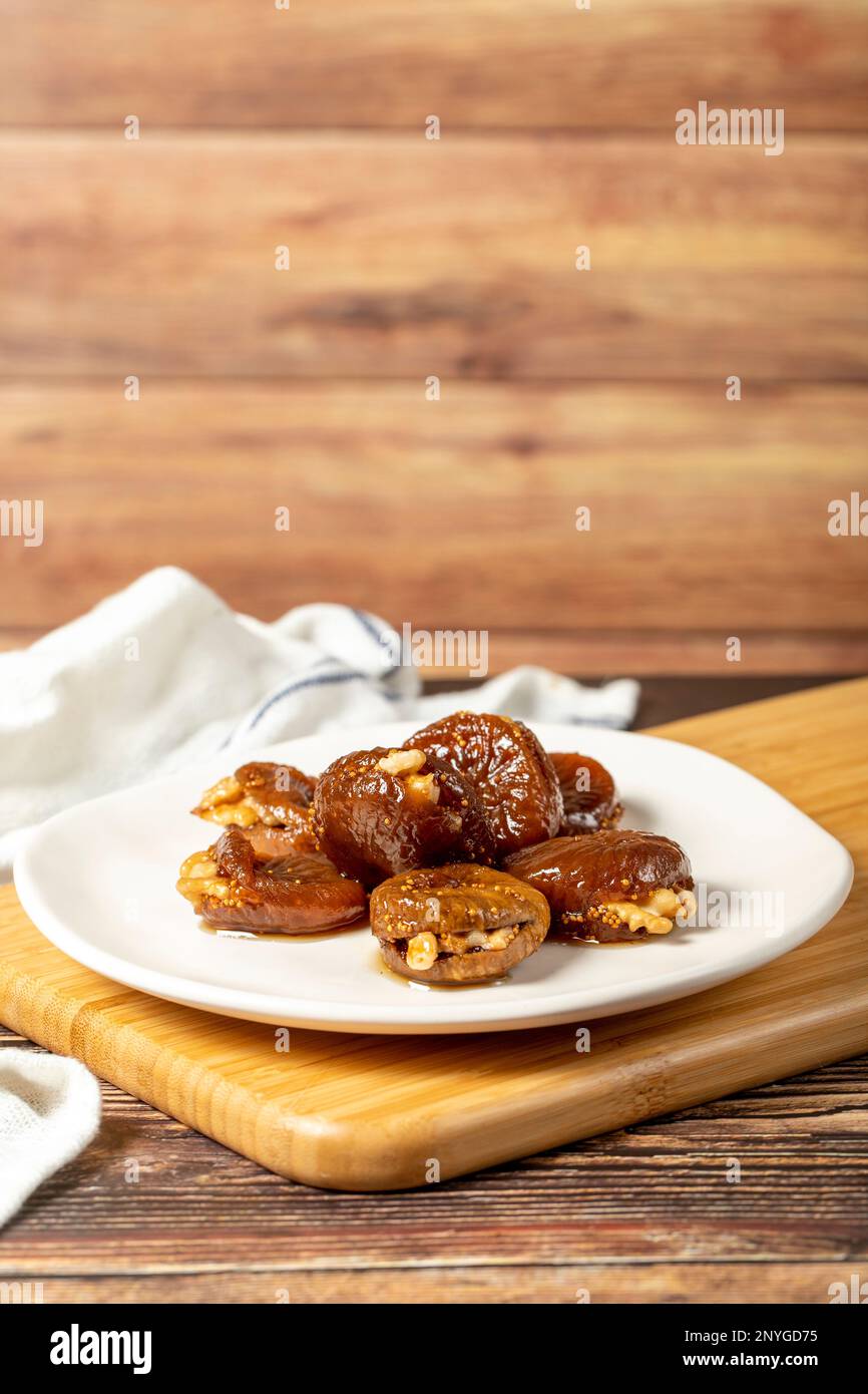 Walnut stuffed figs. Traditional Turkish sweets. Fig dessert with ...