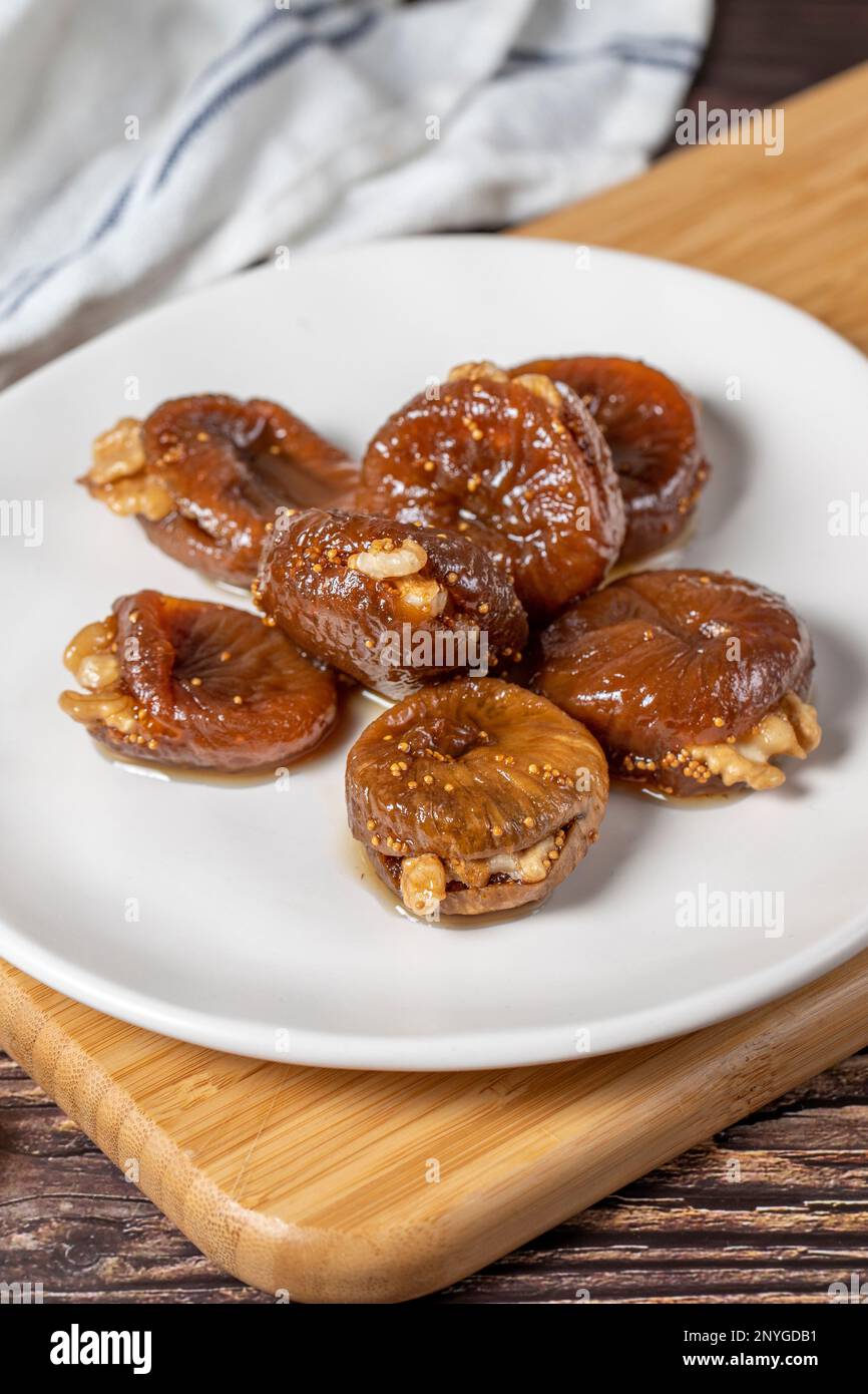 Walnut stuffed figs. Traditional Turkish sweets. Fig dessert with ...