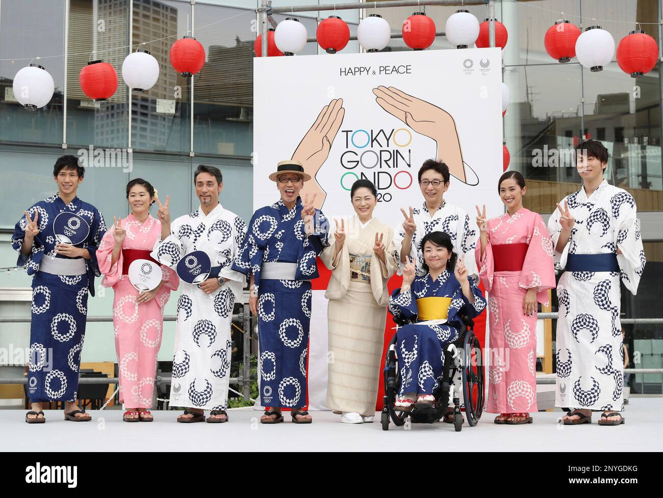 People clad in yukata (Japanese summer kimono with emblem design of the ...
