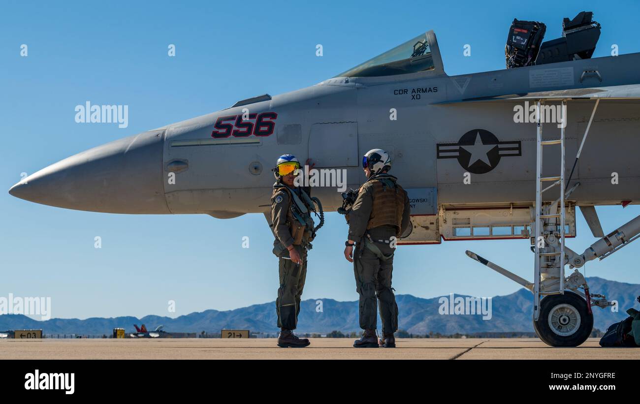 U.S. Navy Lt. Lenue Gilchrist (left), EA-18G Growler aircrew electronic ...