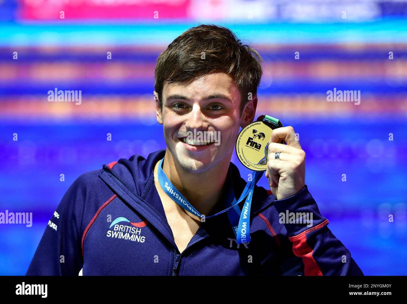 Thomas Daley of Great Britain poses with his gold medal won in the men ...