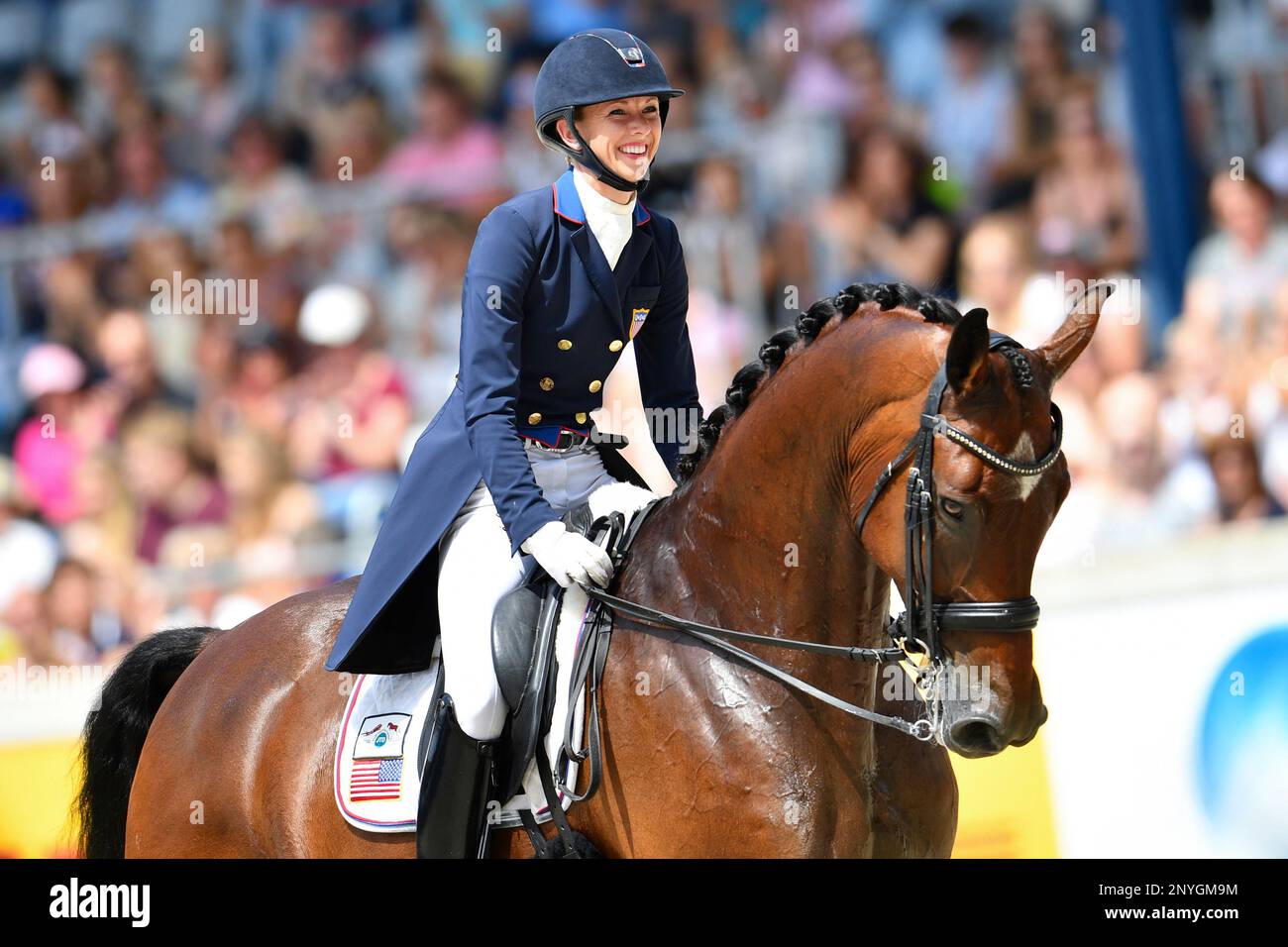 Dressage rider Laura Graves of the U.S. competes on her horse Verdades ...