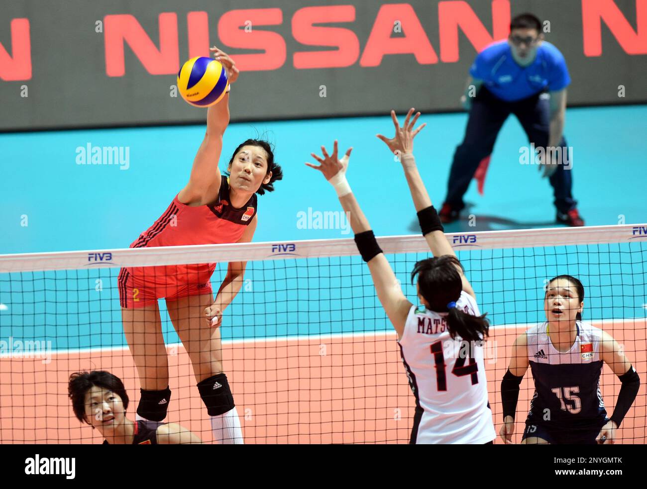 Zhu Ting of China spikes against Ayaka Matsumoto of Japan during the Pool G1-Group 1 match of ...