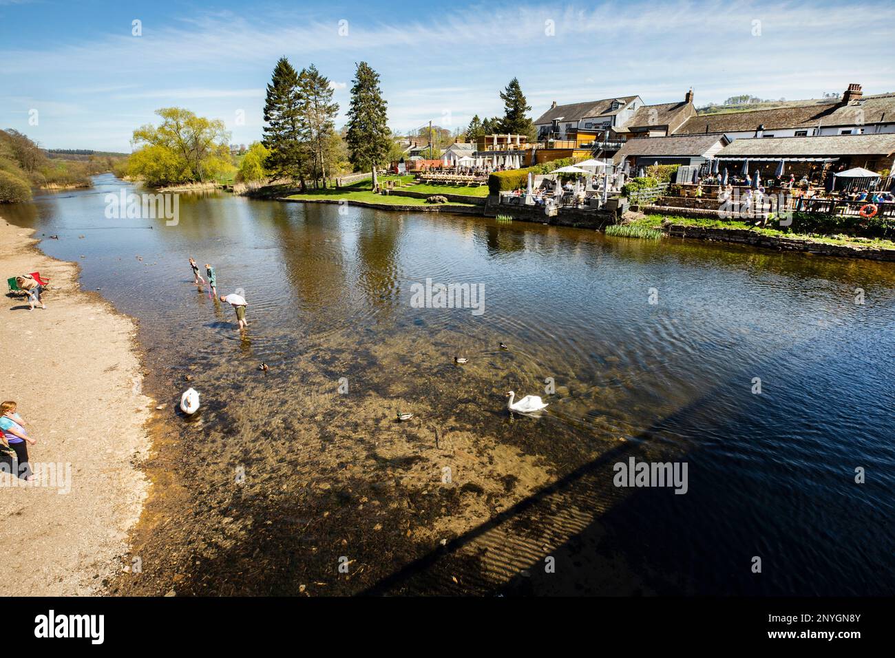 A busy cafe and tearoom beside the River Eamont with tourists eating ...