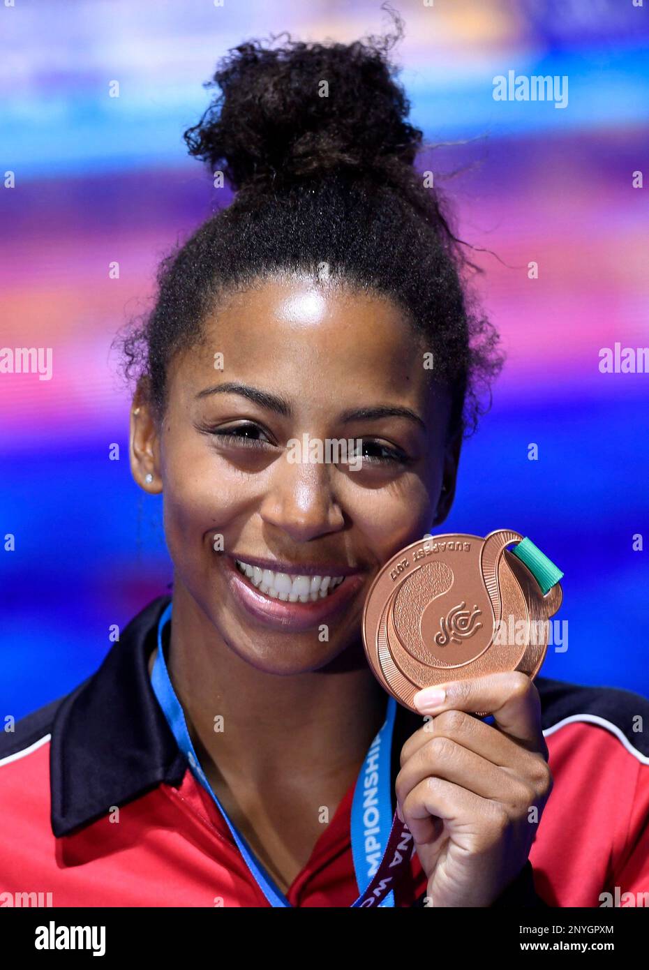Jennifer Abel of Canada poses with her bronze medal won in the women's ...