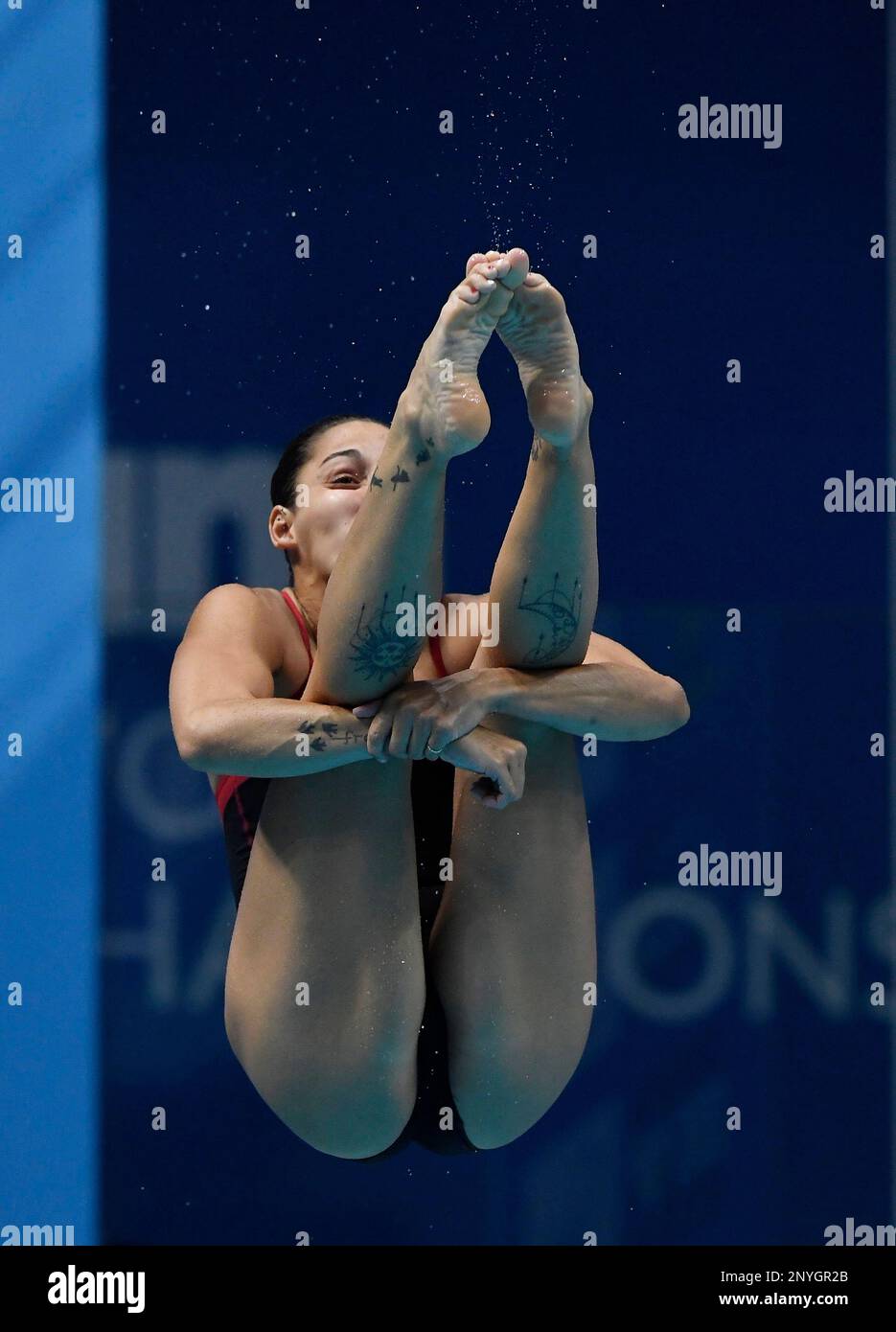Pamela Ware of Canada competes in the women's diving 3m springboard ...