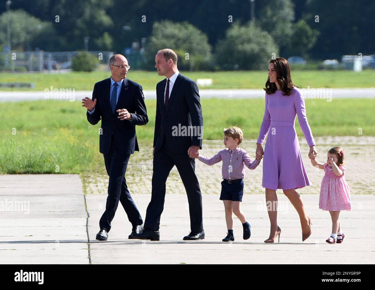 Britain's Prince William, second left, and his wife Kate, the Duchess ...