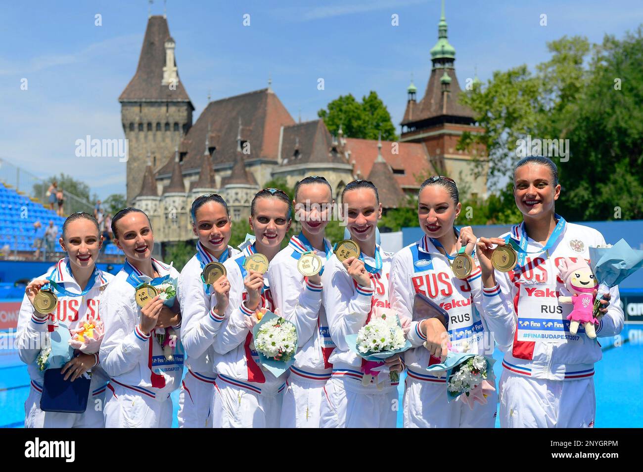 Russia's team members show their gold medal at the end of the women's ...