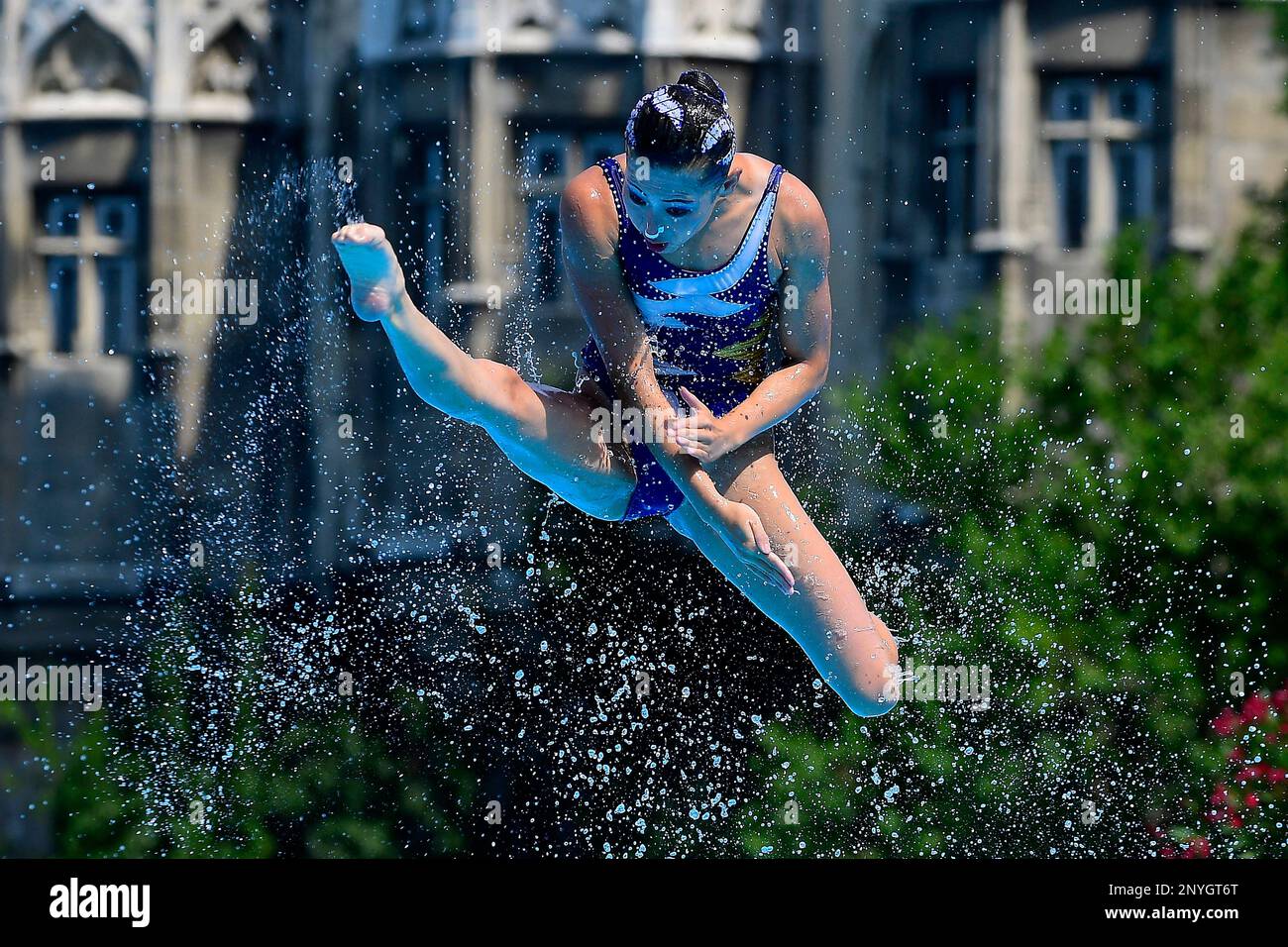 A member of Team North Korea's team performs during the women's team ...