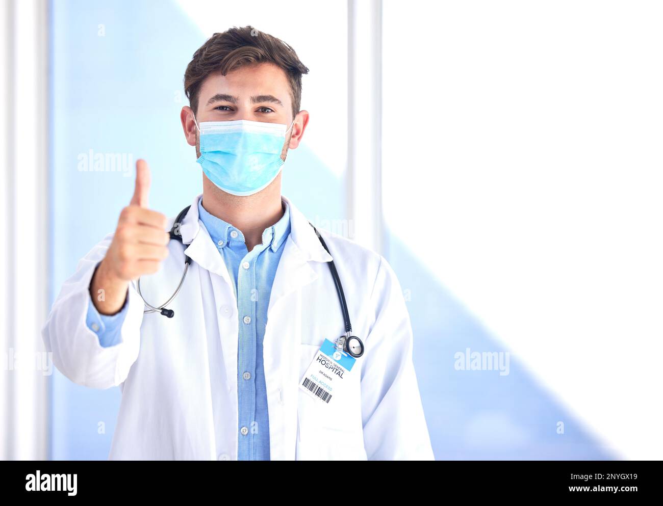 Portrait, doctor and man with thumbs up, mask and success for cure ...