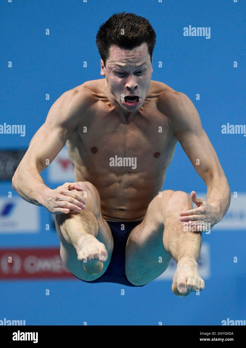 Patrick Hausding of Germany competes in the men's diving 3m springboard ...