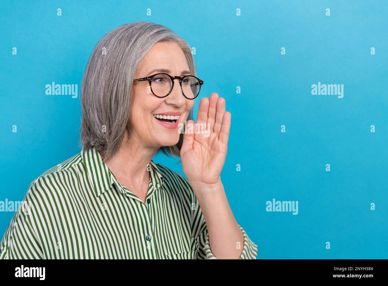 Portrait photo of attractive senior business lady wear striped shirt ...