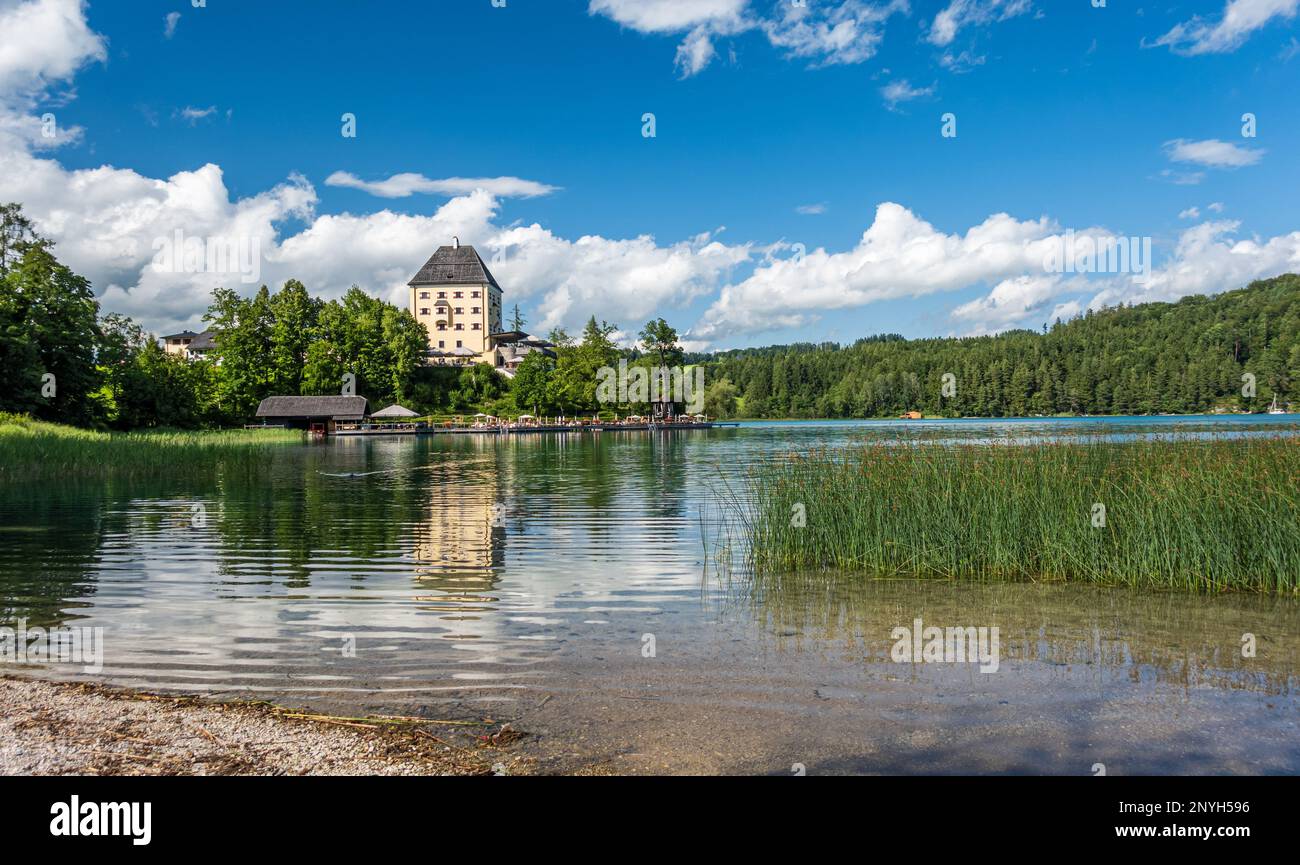 View of Schloss Fuschl from a distance, reflecting itself at lake ...