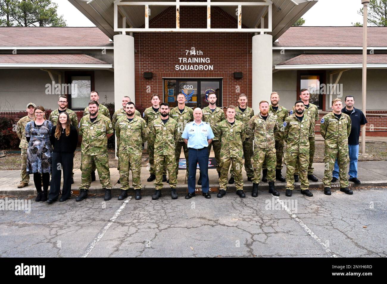 Airmen and civilians from the Royal New Zealand Air Force pose with ...
