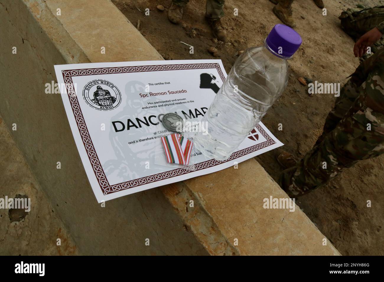 A Danish Contingent March, DANCON, certificate and medal rest on a ...