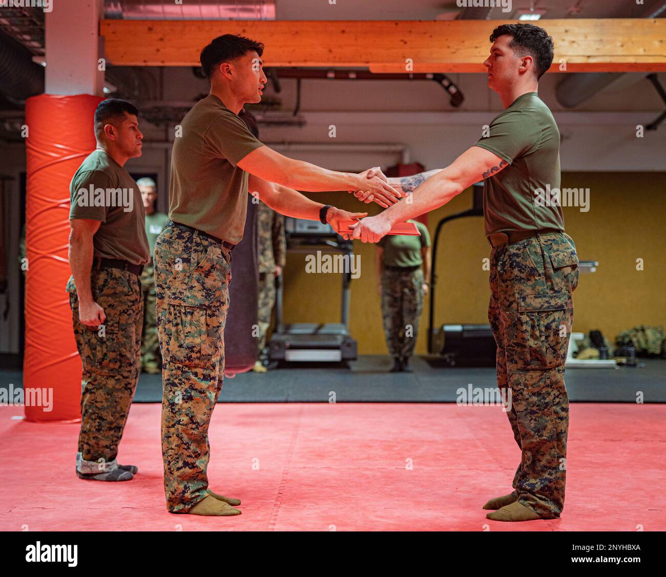 U.S. Marine Corps Capt. Nicholas Huang (left), a company commander with ...