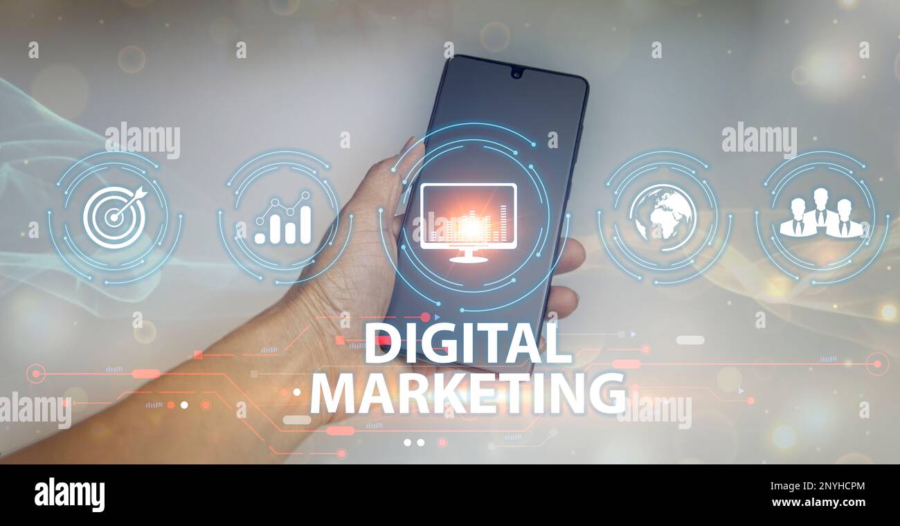 Hand holding a smartphone showing signs and icons of digital marketing ...