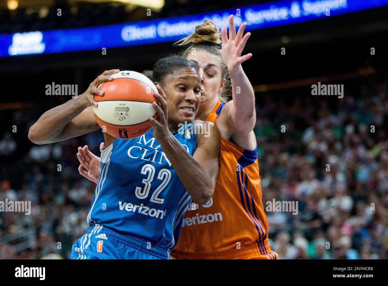Minnesota Lynx forward Rebekkah Brunson (32) moves past Phoenix Mercury ...