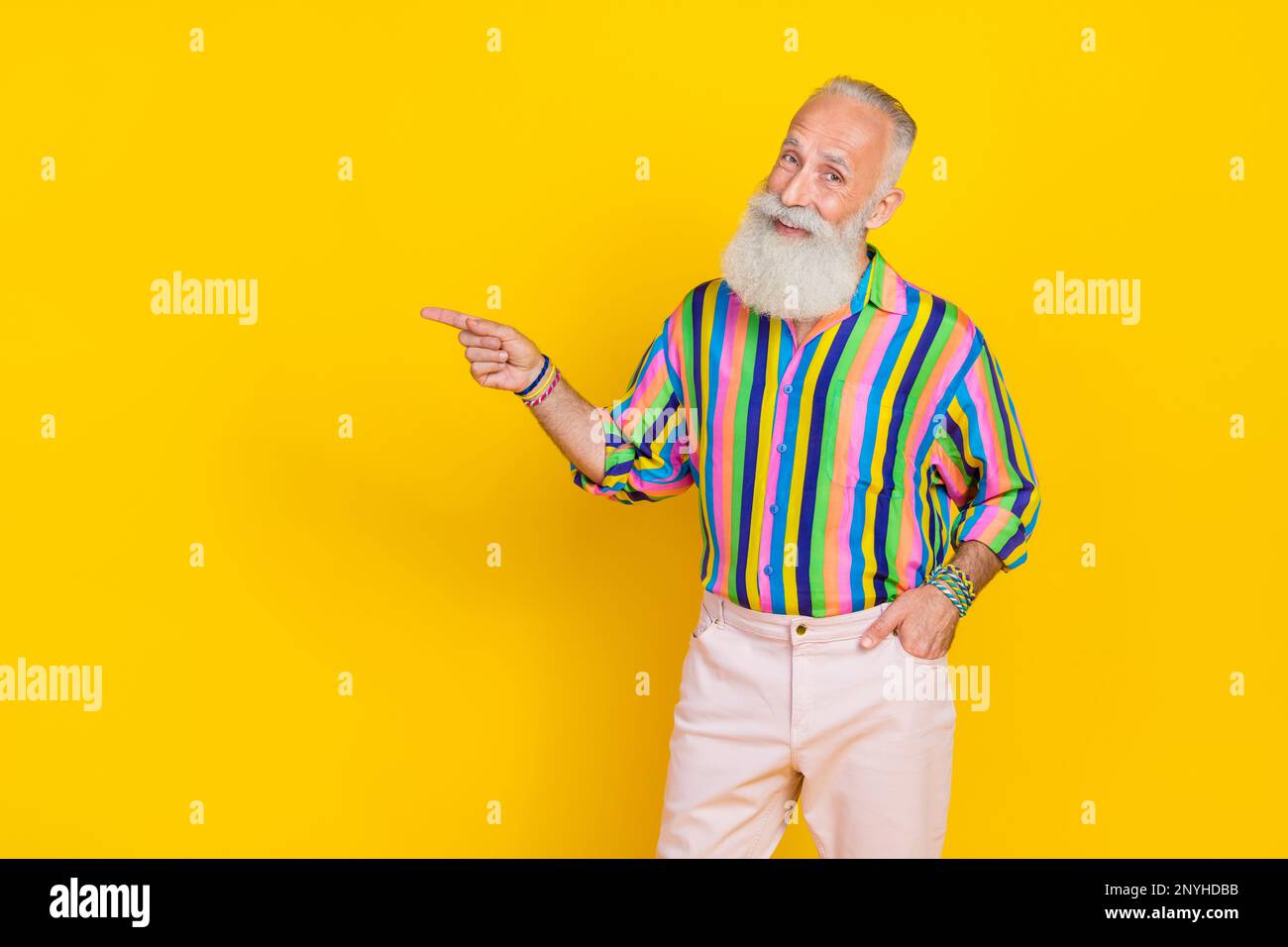 Photo of positive nice person indicate finger empty space proposition ...