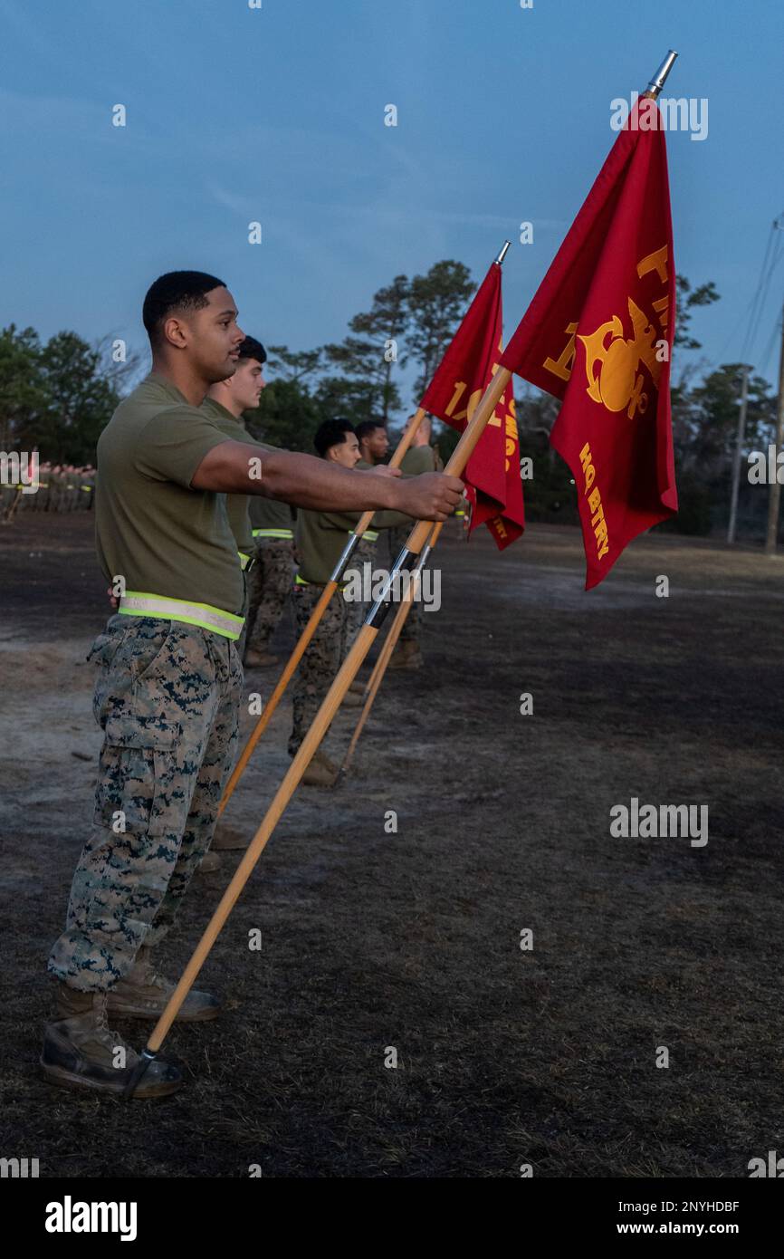 U.S. Marines with 10th Marine Regiment, 2d Marine Division, stand in ...