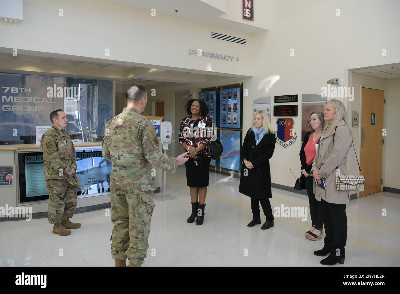 Col. Michael Frayser, 78th Medical Group commander, greets the Air ...