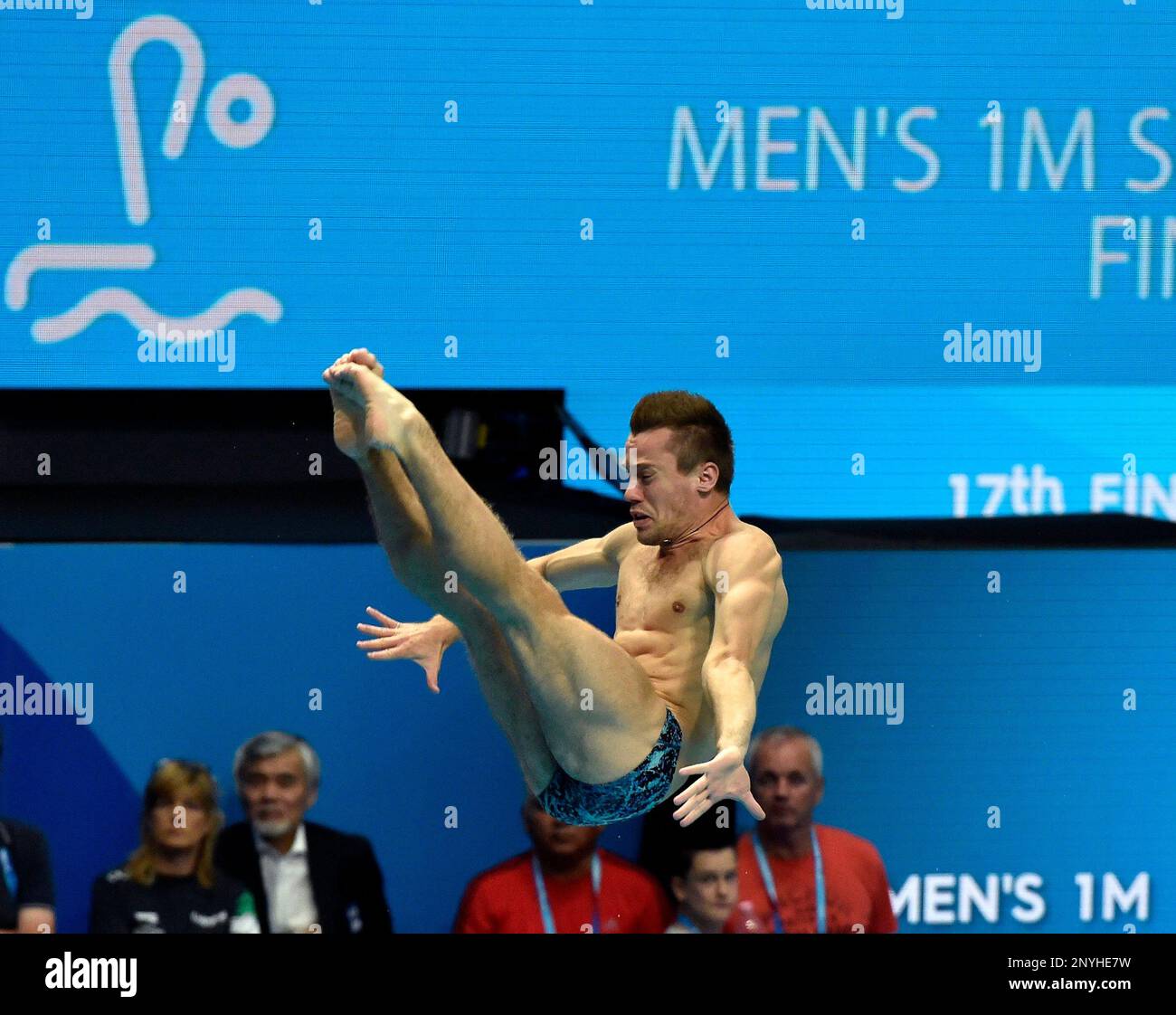 Oleg Kolodiy of Ukraine competes in the men's diving 1m springboard ...