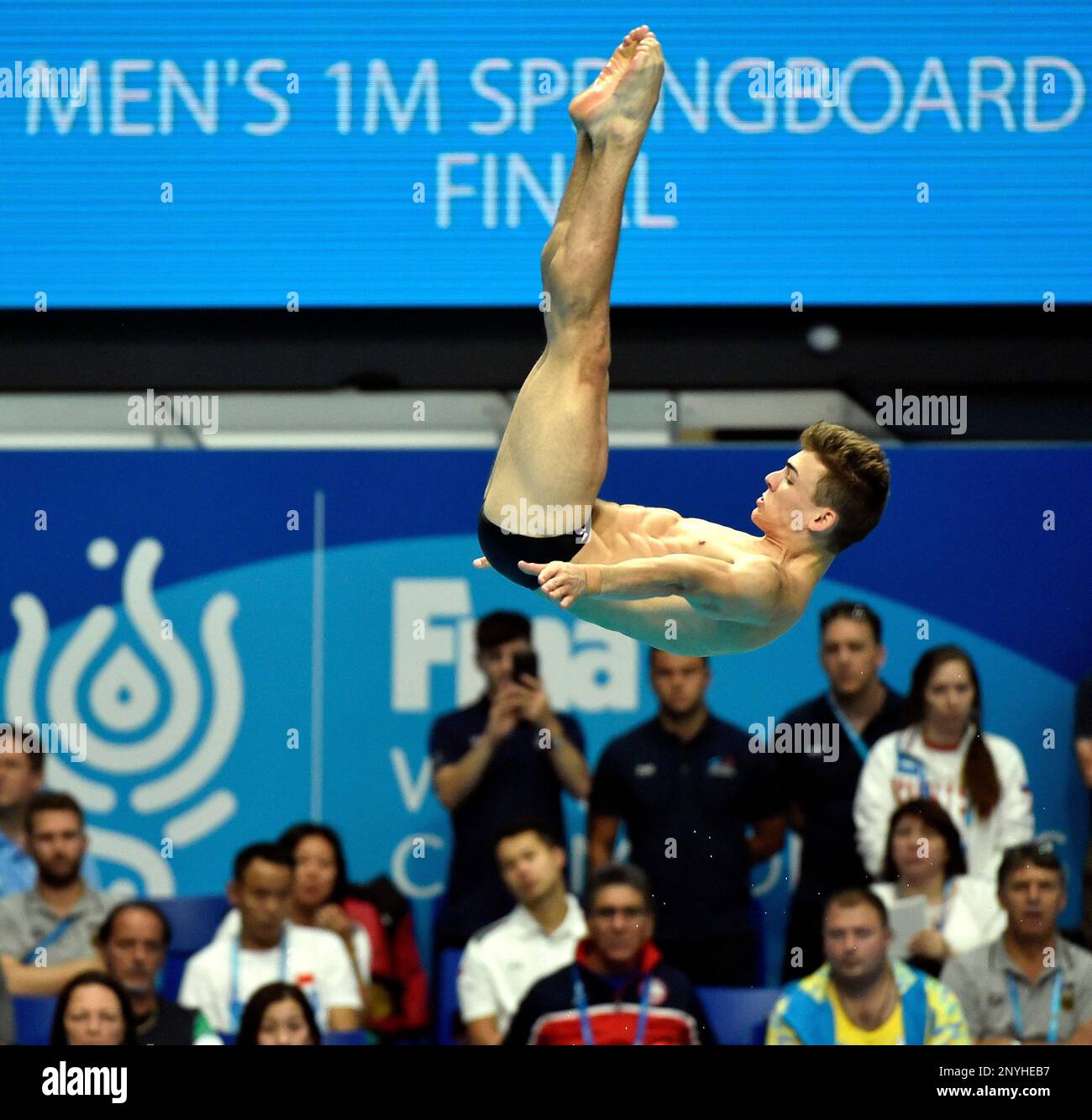 Ross Haslam of Great Britain competes in men's diving 1m springboard ...