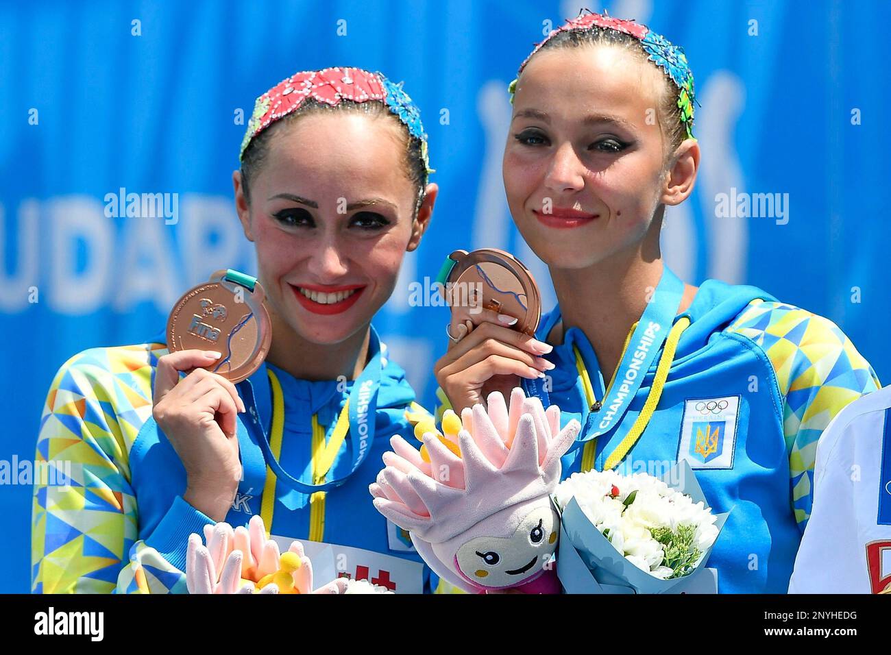 Anna Voloshyna, left, and Yelyzaveta Yakhno of Ukraine pose with their ...